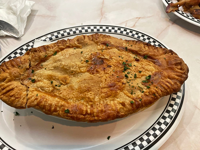 This chicken pot pie isn't just comfort food – it's a warm hug for your taste buds. Grandma, your crown is in danger.