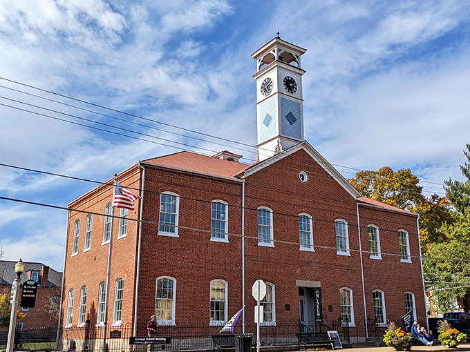 The Historic Hermann Museum's clock tower stands sentinel over town, its brick facade housing treasures from an era when "social media" meant gathering at church.