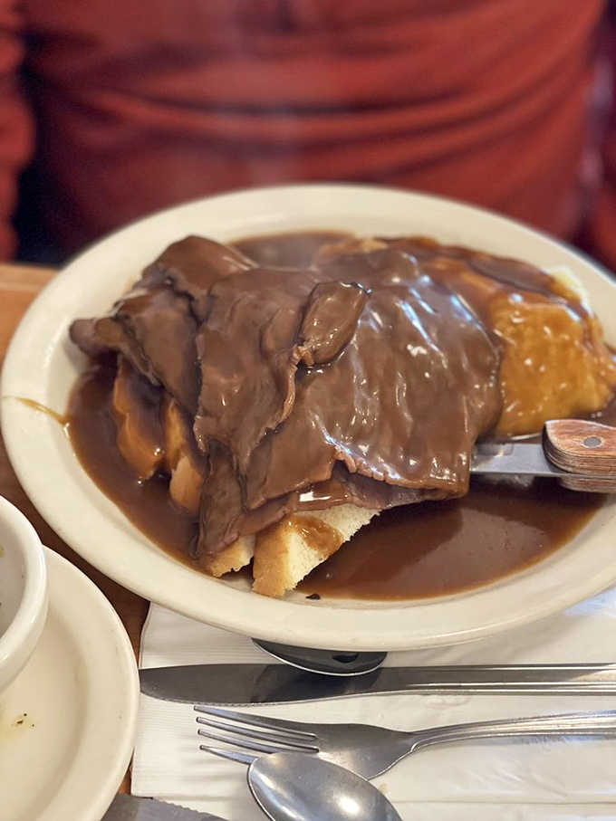 Behold, the hot roast beef sandwich – comfort food's answer to a warm bear hug. It's what love would look like if it were edible.