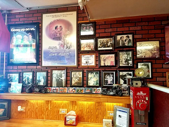 Wall of fame or time machine? Ken's photo-adorned walls are like a scrapbook of pop culture, serving up a side of nostalgia with every meal.