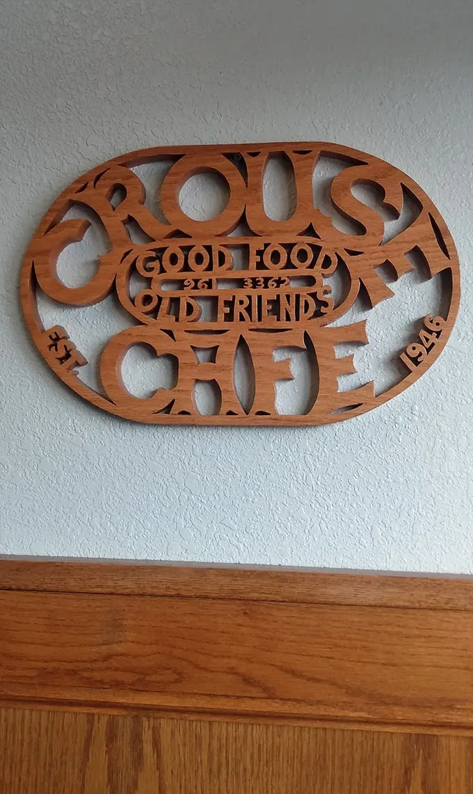 "Good food, old friends" – truer words were never carved. This wall decor sums up Crouse Café's philosophy better than any Yelp review ever could.