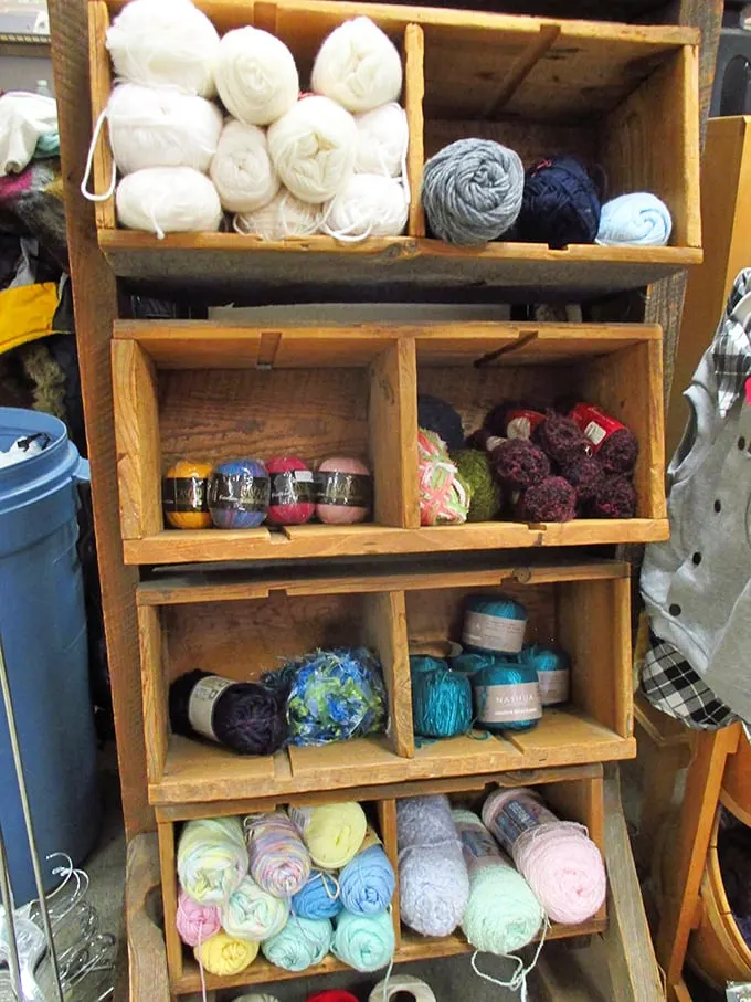 Knit happens! This yarn corner is a colorful chaos of potential, where half-finished scarves go to dream of becoming sweaters.