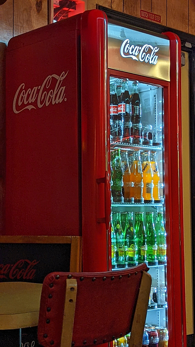 The Coca-Cola shrine: Where fizzy dreams come true and nostalgia flows freely. It's like a time machine, but with better refreshments.