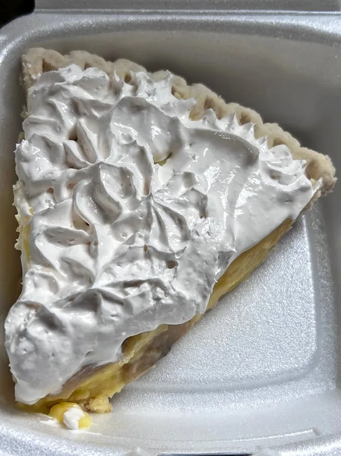 Coconut cream pie that doesn't just end a meal—it provides closure and satisfaction worthy of a rom-com finale. Meringue piled high like weekend hopes.