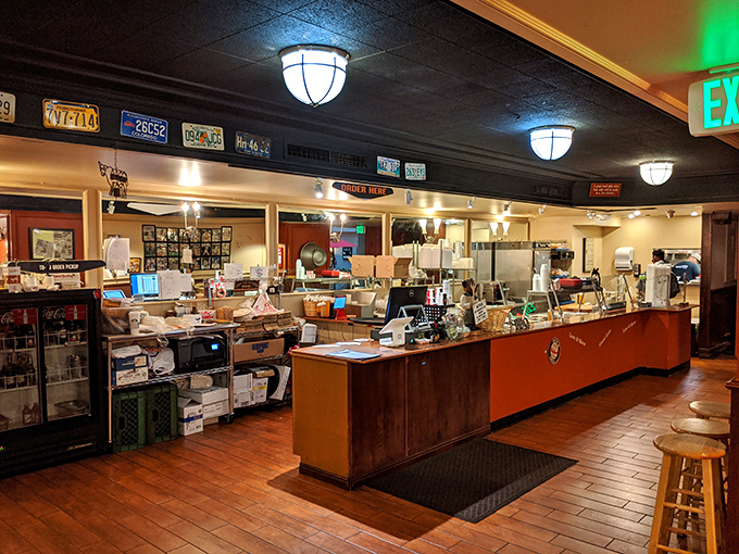 "Behind the scenes of flavor town!" This bustling counter area is where BBQ magic happens - a symphony of smoke, spice, and everything nice.