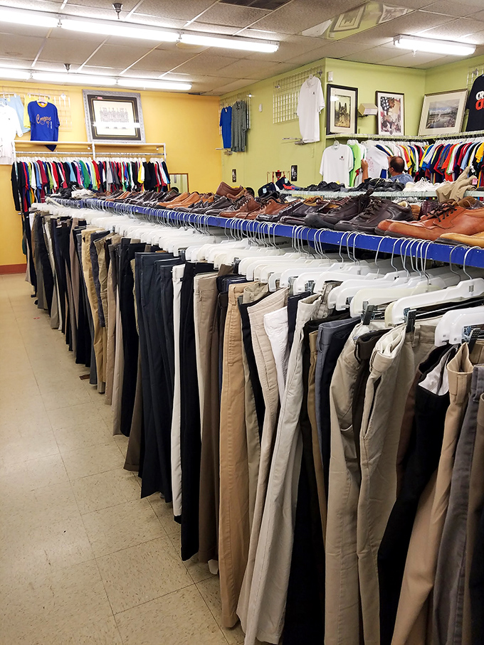 Men's pants organized with military precision. Finding your size feels like winning a small lottery without having to buy a ticket.