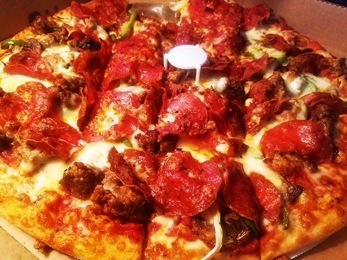 Pizza perfection! This cheesy, saucy, meaty masterpiece is proof that sometimes the best things in life come in circular form.