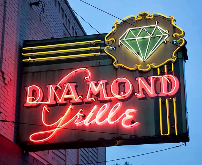 By day, it's a promise. By night, it's a beacon. Always, it's an invitation to indulge in a slice of Akron's culinary history.