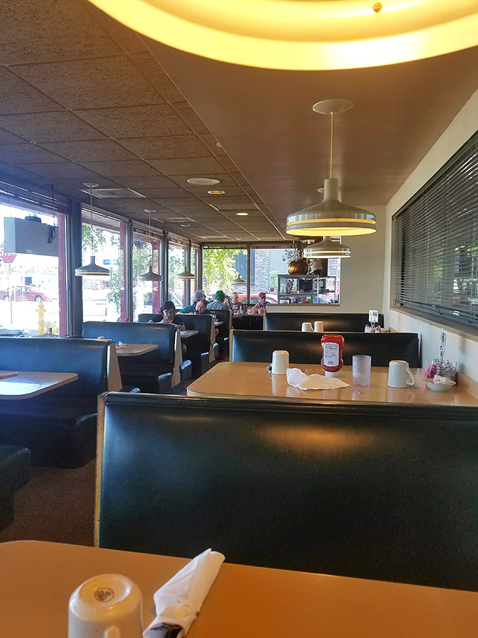 A sea of blue booths and formica tables - the natural habitat of the wild North Dakota breakfast enthusiast. Observe them in their element.