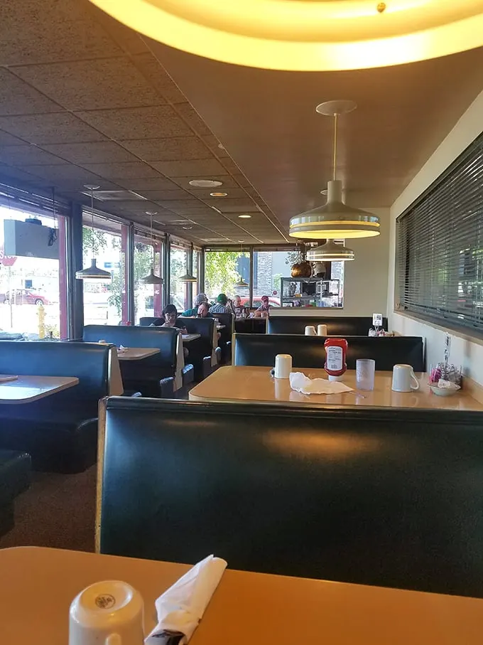 A sea of blue booths and formica tables - the natural habitat of the wild North Dakota breakfast enthusiast. Observe them in their element.