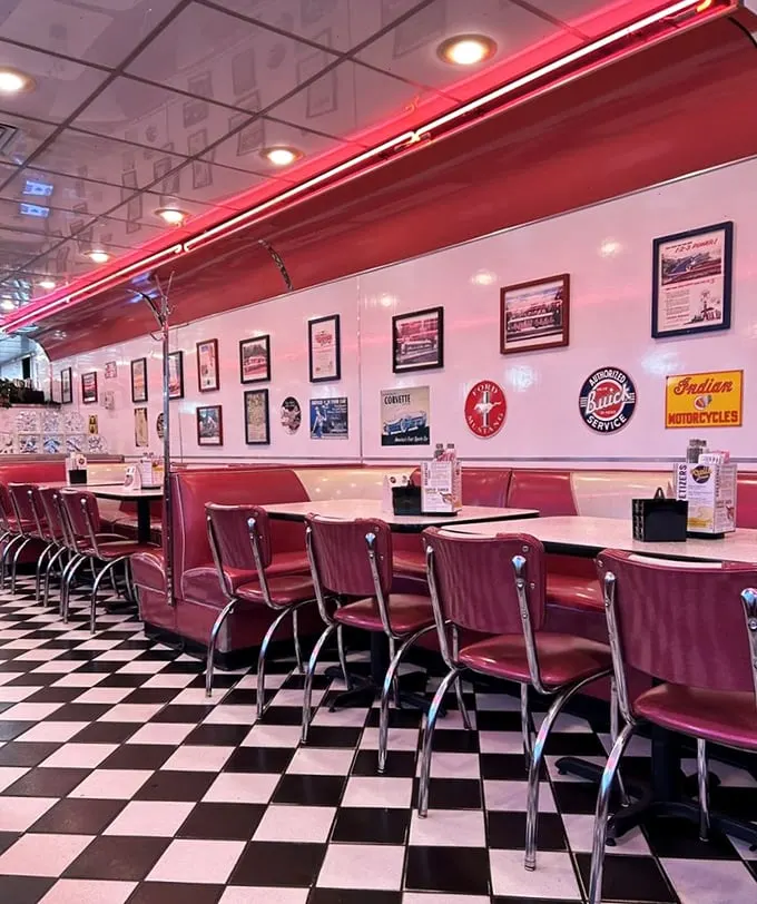 Red booths, chrome accents, and walls adorned with nostalgia. It's not just a meal, it's a trip down memory lane with a side of fries.