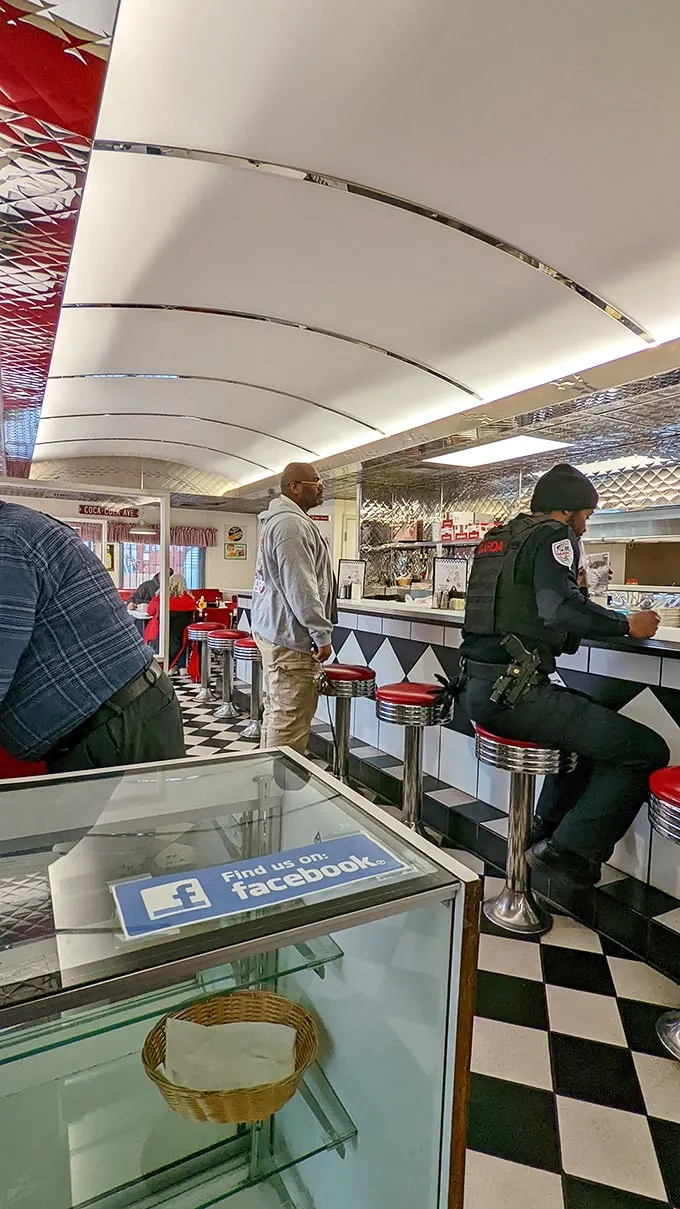 The counter seating—where solo diners become part of the diner family and police officers get their coffee exactly how they like it.