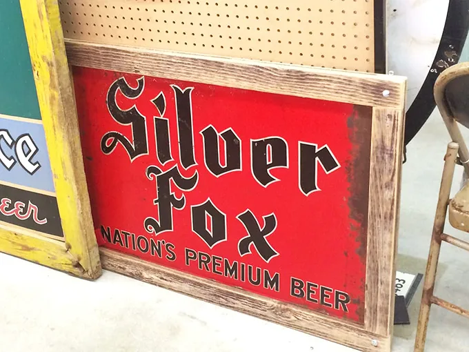 When beer signs were works of art. Silver Fox indeed – this vintage ad is pure liquid gold.