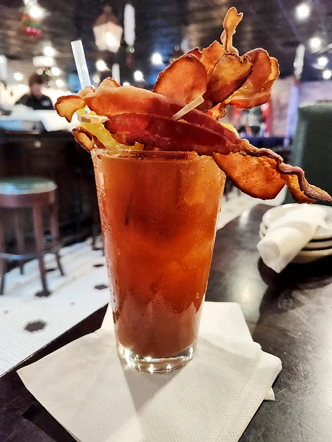 This Bloody Mary isn't just a drink; it's a meal with a straw. Topped with enough garnishes to qualify as a small salad, it's brunch in a glass.