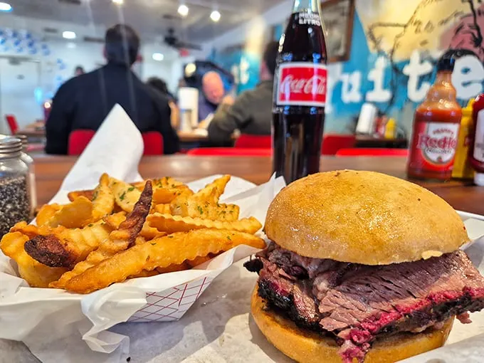 The brisket sandwich doesn't just satisfy hunger—it resolves existential crises. Those crinkle-cut fries aren't mere sides; they're supporting actors.