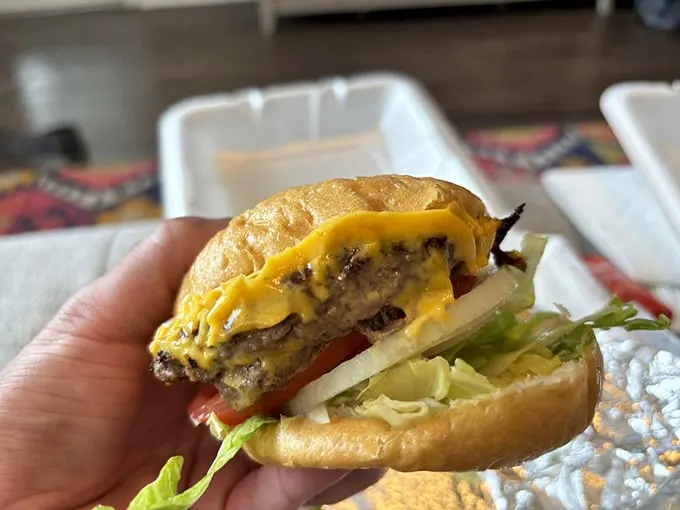 Meet the Brown's Cheeseburger: a handheld masterpiece that'll make your taste buds do a two-step. Napkins required, but totally worth it.