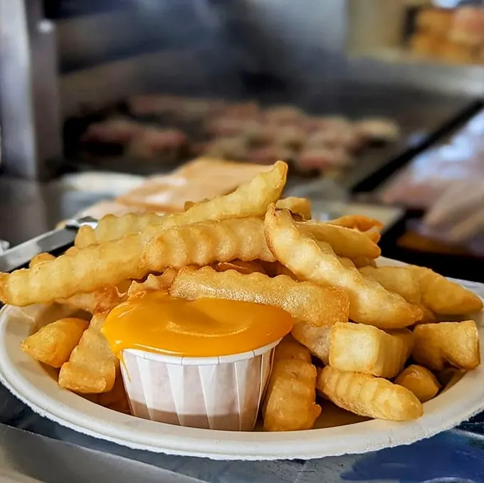 Fries with benefits! These golden beauties come topped with a gooey cheese sauce that would make even a potato feel special.
