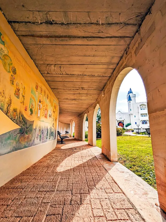 Walk through history! This hallway, with its arched ceilings and colorful murals, is like a time machine with better lighting.