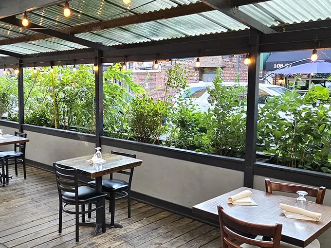 Dine under the sky in Reef's lush patio. It's like a secret garden, if gardens served amazing seafood instead of growing vegetables.