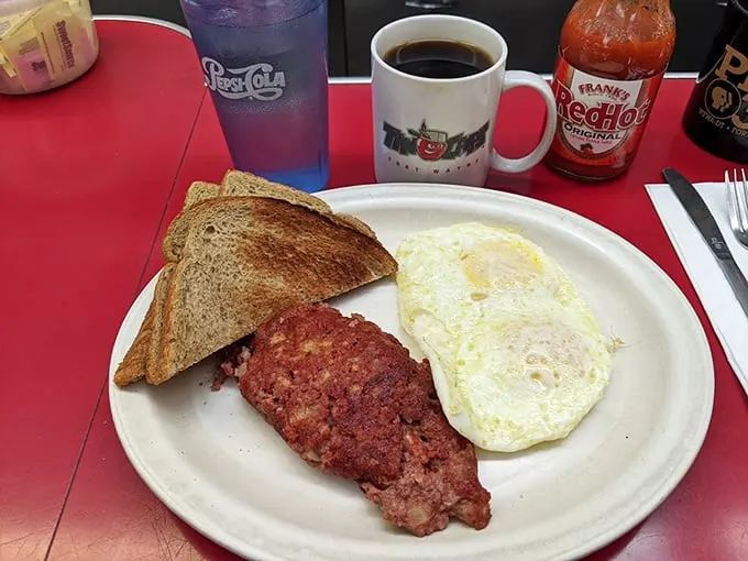 Corned beef hash, toast, and a perfect egg—the breakfast equivalent of a power trio. No fancy plating needed when flavor does all the talking.
