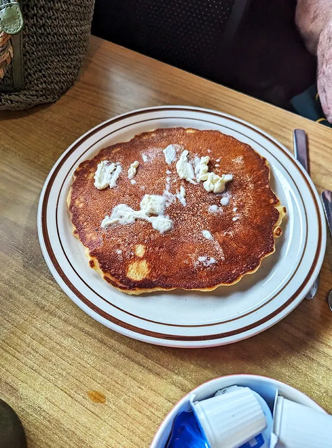 Pancake paradise! This golden disc of deliciousness is just begging for a river of maple syrup and a pat of melty butter.