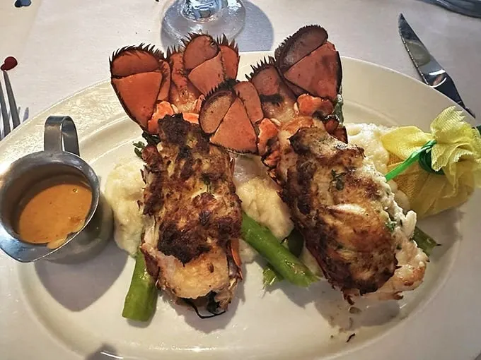 Lobster tails so stuffed, they're like the Thanksgiving turkey of the sea. Butter-basted bliss on a plate!