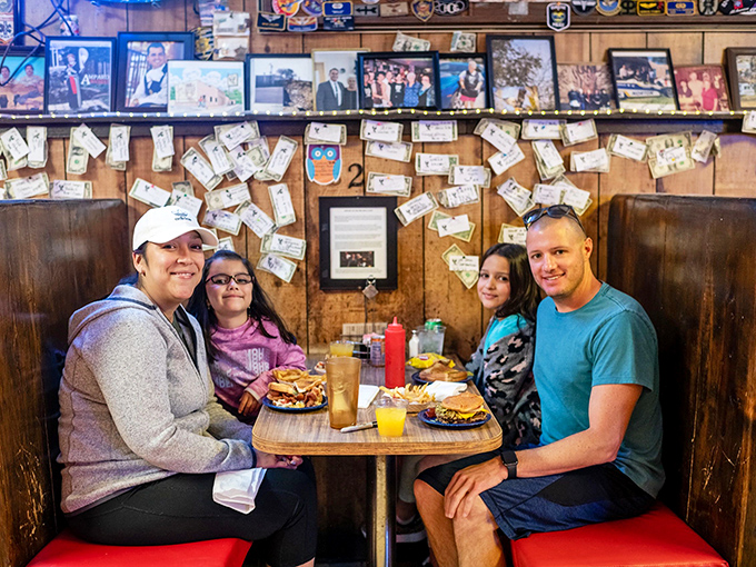 Family, food, and a wall full of memories – it's like Norman Rockwell painted a scene in New Mexico. Pass the ketchup, please!