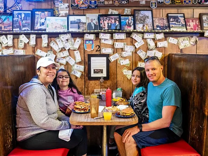 Family, food, and a wall full of memories – it's like Norman Rockwell painted a scene in New Mexico. Pass the ketchup, please!