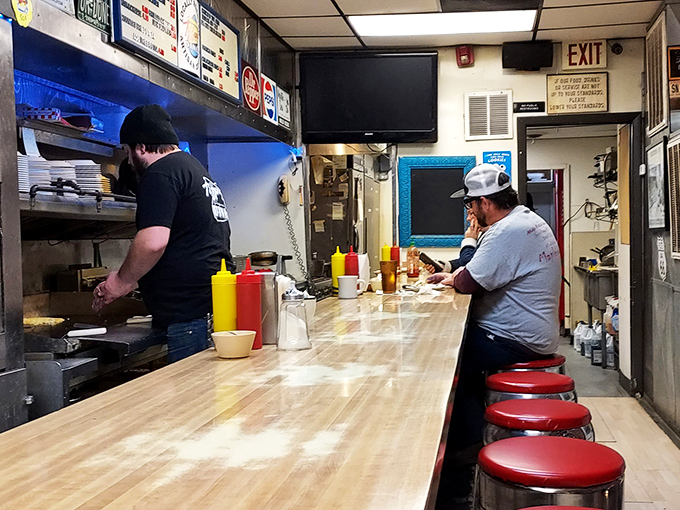 Behind the scenes of breakfast magic. These culinary wizards work their griddle alchemy, turning simple ingredients into plates of pure joy.