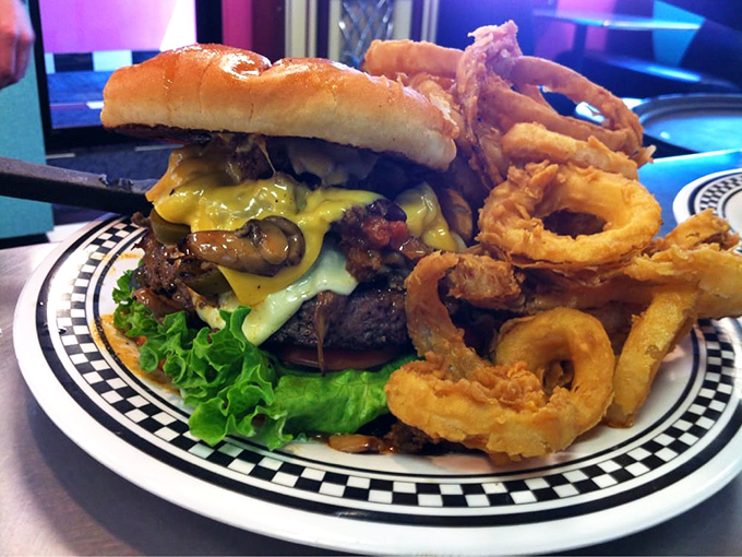 Burger bliss achieved! This bacon mushroom masterpiece is stacked higher than my to-read pile and twice as satisfying.