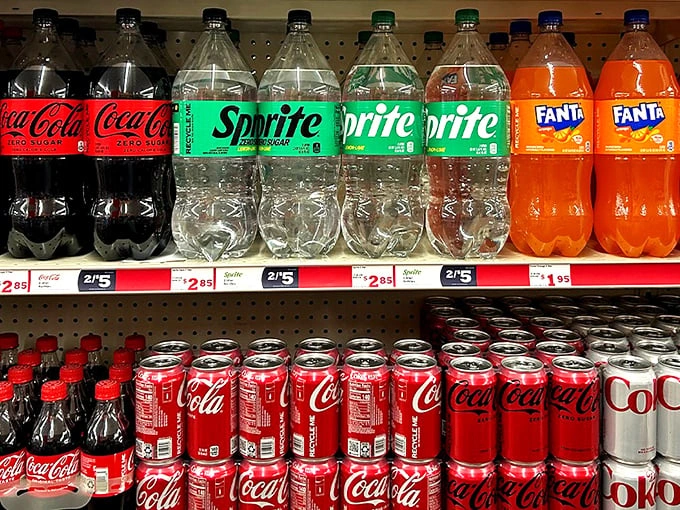 The soda section – where Coca-Cola, Sprite, and Fanta gather for what appears to be a very fizzy convention at 2 for $5.