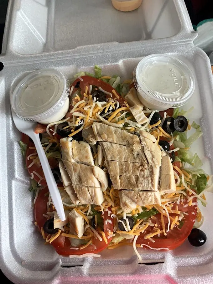 Who says you can't be healthy at a burger joint? This grilled chicken salad is fresh, fabulous, and guilt-free(ish).