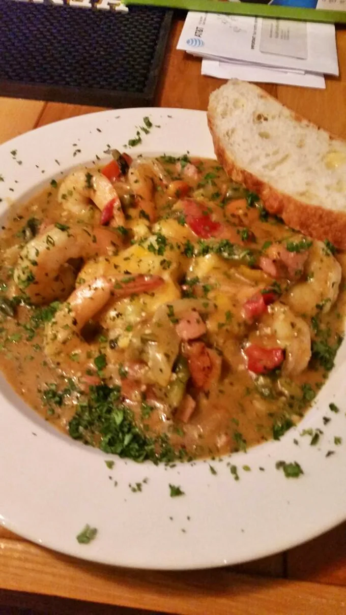 Shrimp and grits: The South's answer to surf and turf. It's like a warm hug for your taste buds.