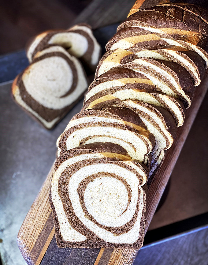 Bread so beautiful, it's practically modern art. Van Gogh would've loved to paint this swirly masterpiece – if he didn't eat it first.