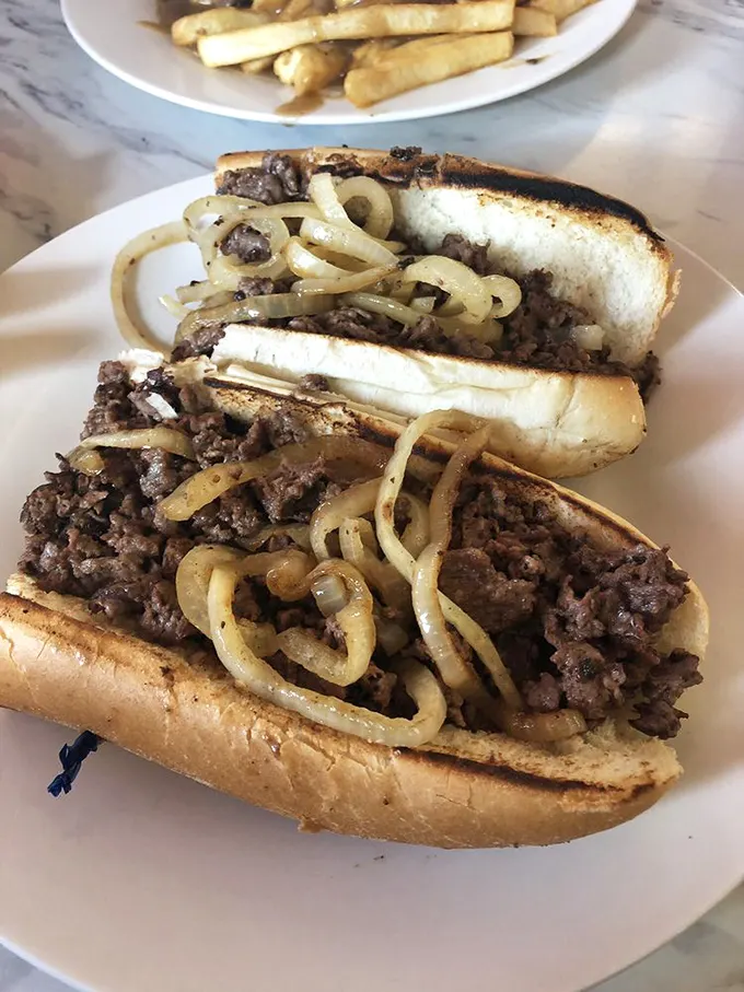 The cheesesteak: Philly's gift to the world, perfected in Scranton. It's a sandwich that demands both hands and zero shame.
