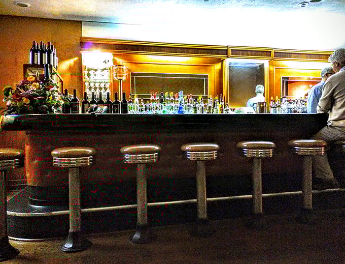 Pull up a stool and settle in. This isn't just a bar; it's front-row seats to the greatest show in town – dinner and a show, all in one.