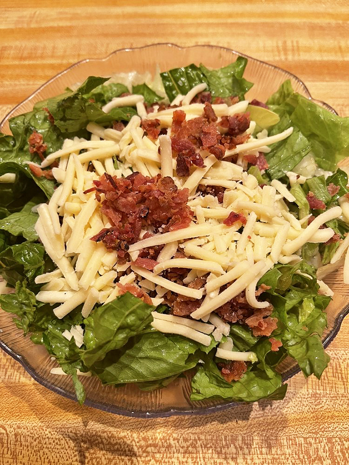 Salad sensation! This isn't just rabbit food – it's a crunchy, cheesy celebration that even the most devoted carnivore can appreciate.