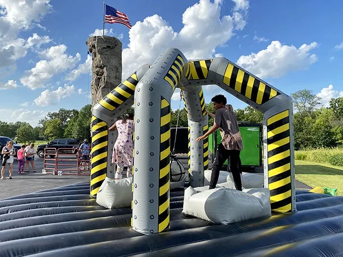 Hold onto your bonnets! Arthur's inflatable obstacle course proves that even in Amish country, fun comes in all shapes and sizes.