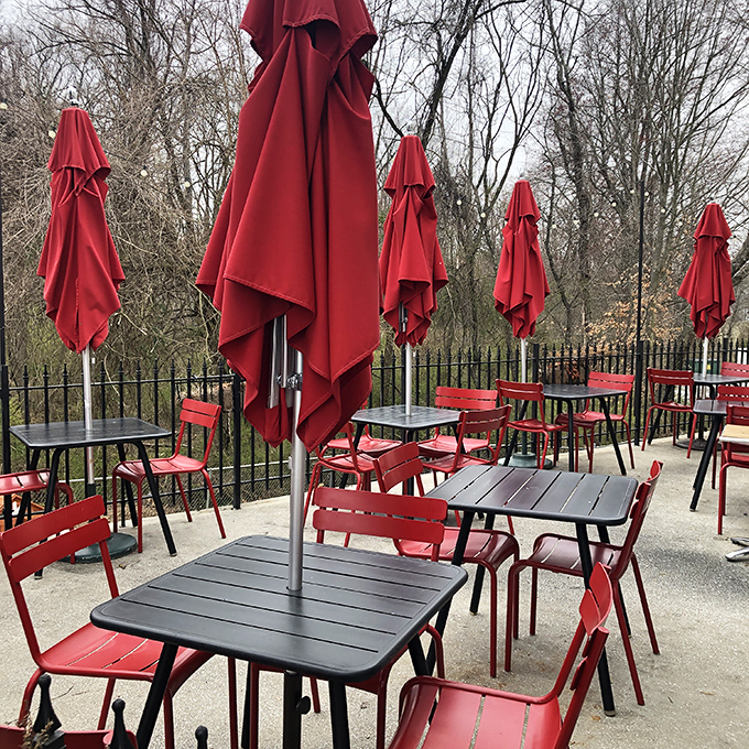 The outdoor patio—where the red umbrellas match the passion they put into proving plants can be the star of any meal.