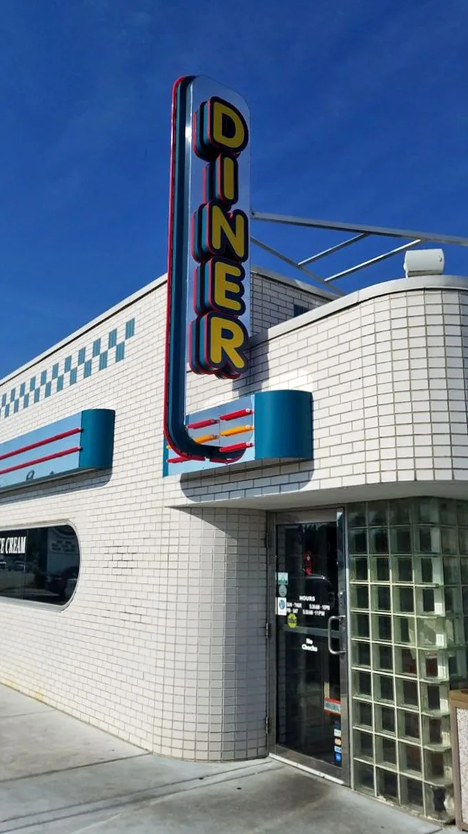 A slice of Americana! Jimmie's Diner stands proud, like a delicious lighthouse guiding hungry travelers to breakfast nirvana.