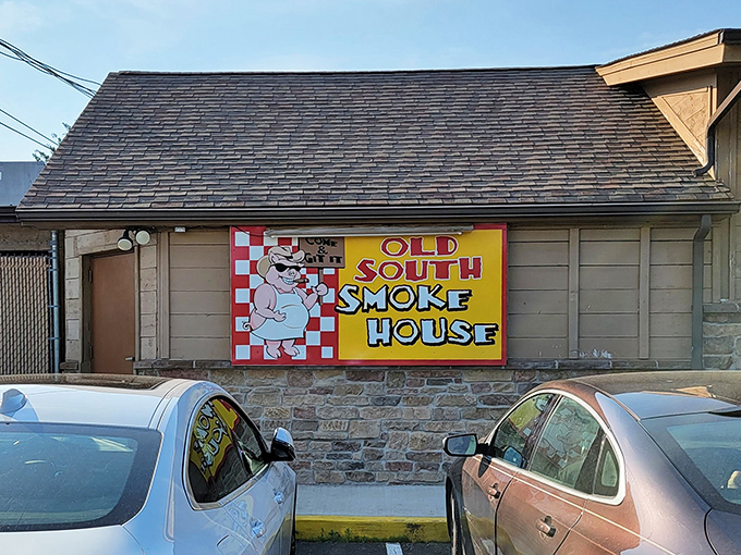 The sign says it all: Old South Smoke House. Where dreams of perfectly smoked meats come true, and diets go to die happily.
