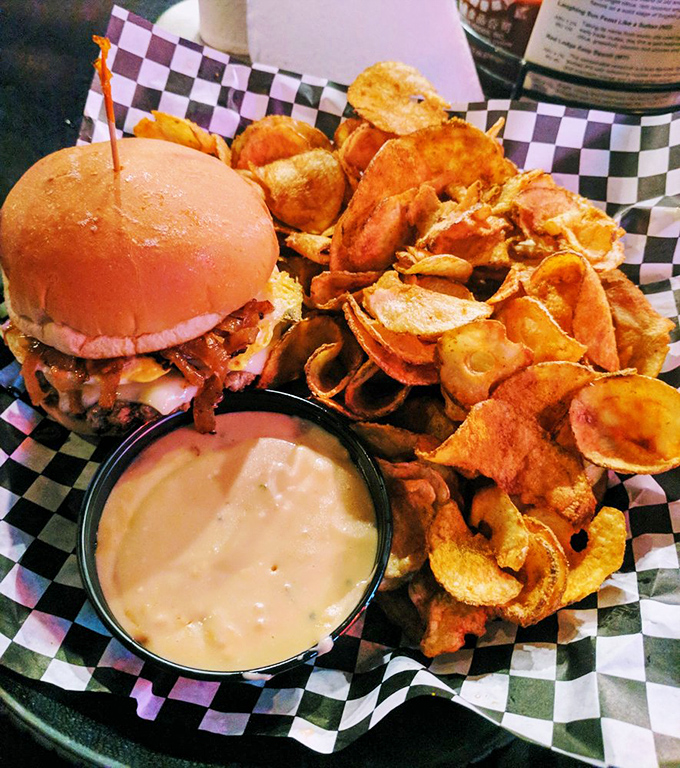 A burger that's more stacked than your grandpa's vinyl collection! Paired with chips that'll make your regular fries jealous.
