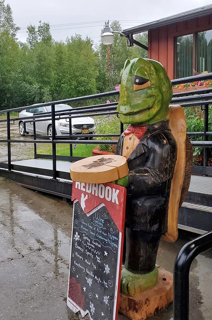 Meet the unofficial greeter of the Turtle Club! This dapper reptile statue is ready to take your order… very, very slowly.
