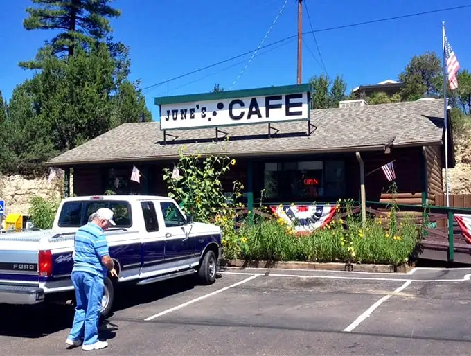 Even the parking lot at June's has character – where pickup trucks and SUVs gather like hungry animals at a delicious watering hole.