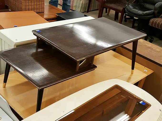 "Table for... how many? This eclectic furniture section is like a game of musical chairs, where every piece tells a different story."