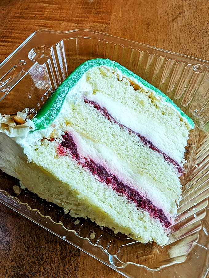 Layer upon layer of pure bliss! This cake slice is the Inception of desserts – a dream within a dream.
