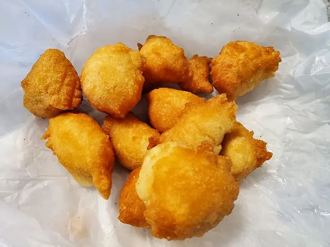 Little golden nuggets of joy! These hush puppies are the perfect sidekick to any BBQ feast – crispy, fluffy, and utterly irresistible.