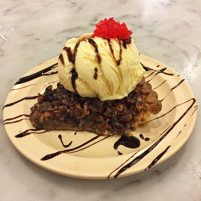 Pecan pie paradise! This slice of heaven is so good, it'll make you want to hug a pecan tree in gratitude.