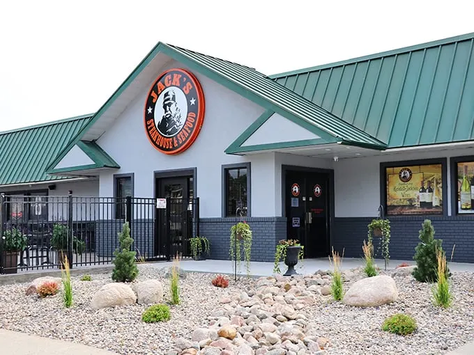 Forget construction zones – this orange oasis serves up steaks so tender, they practically melt on your fork.