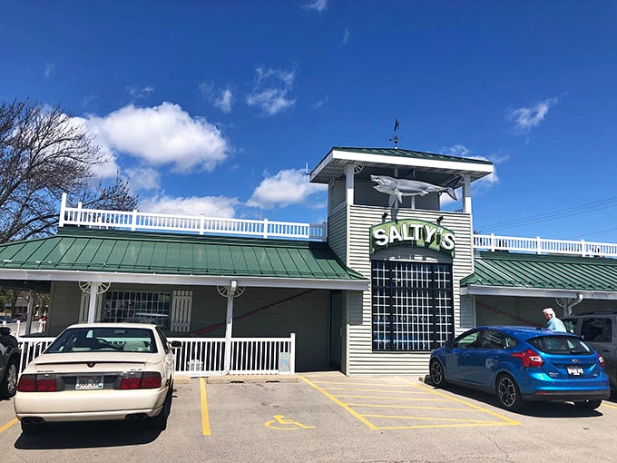 Salty's inviting porch practically whispers, "Come for the fish, stay for the maritime charm." It's like a seaside postcard come to life!